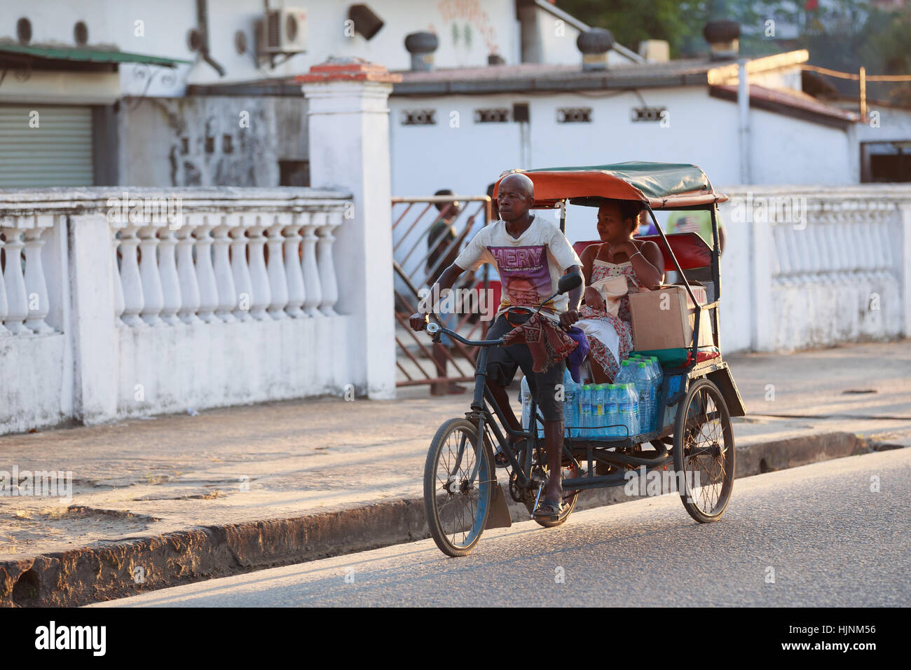 TOAMASINA, MADAGASCAR - OCTOBER 17, 2016: Traditional rickshaw bicycle ...