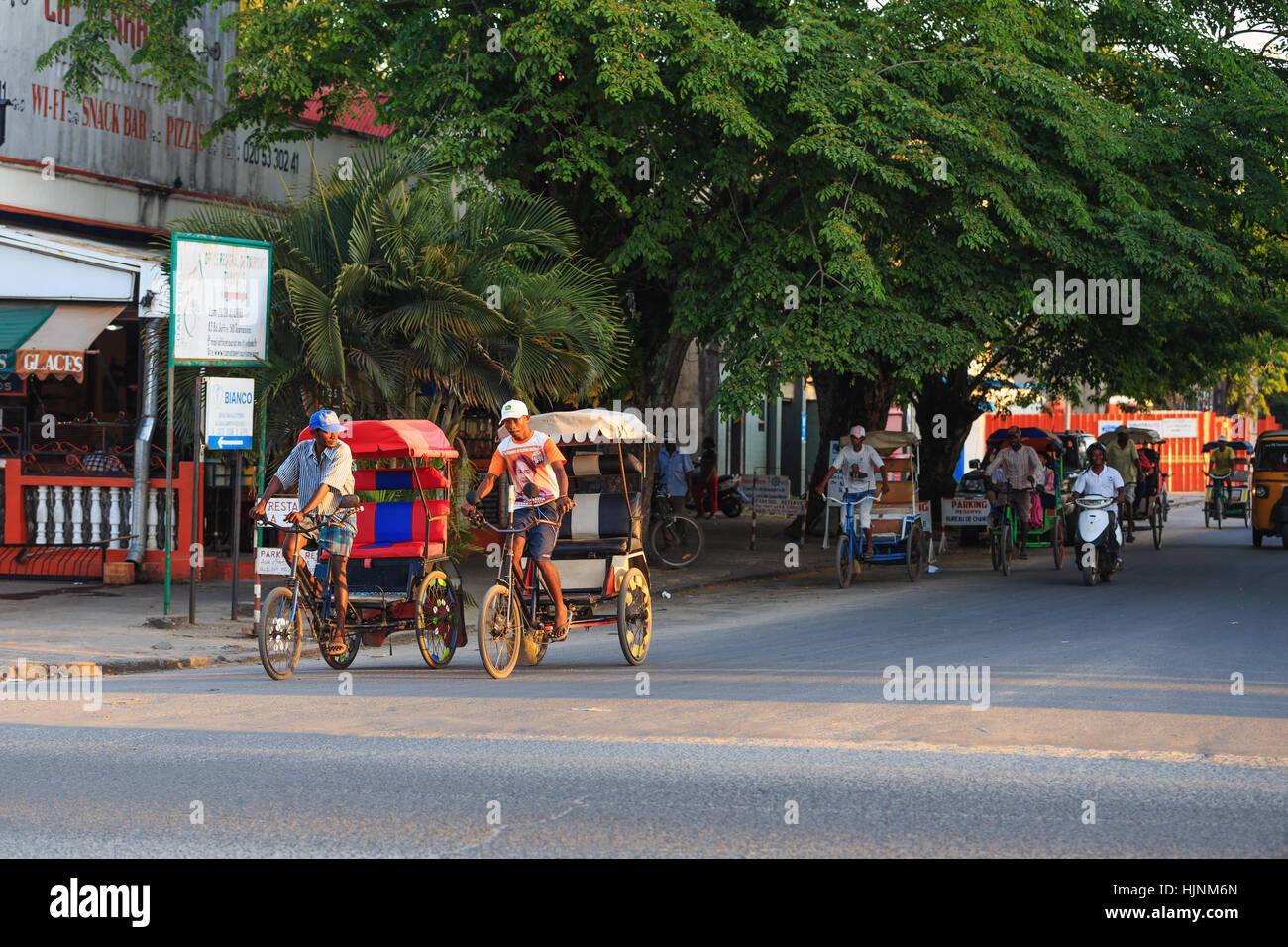 TOAMASINA, MADAGASCAR - OCTOBER 17, 2016: Traditional rickshaw bicycle ...