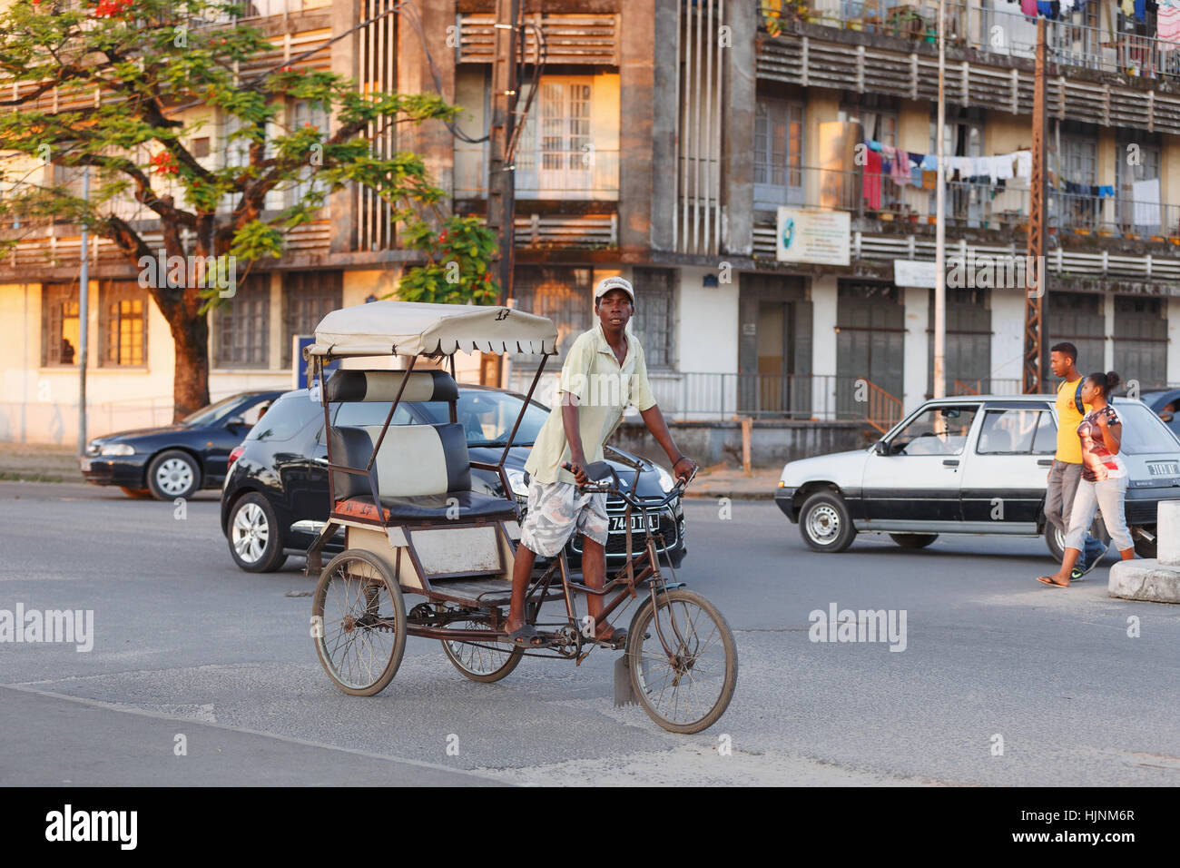 TOAMASINA, MADAGASCAR - OCTOBER 17, 2016: Traditional rickshaw bicycle ...