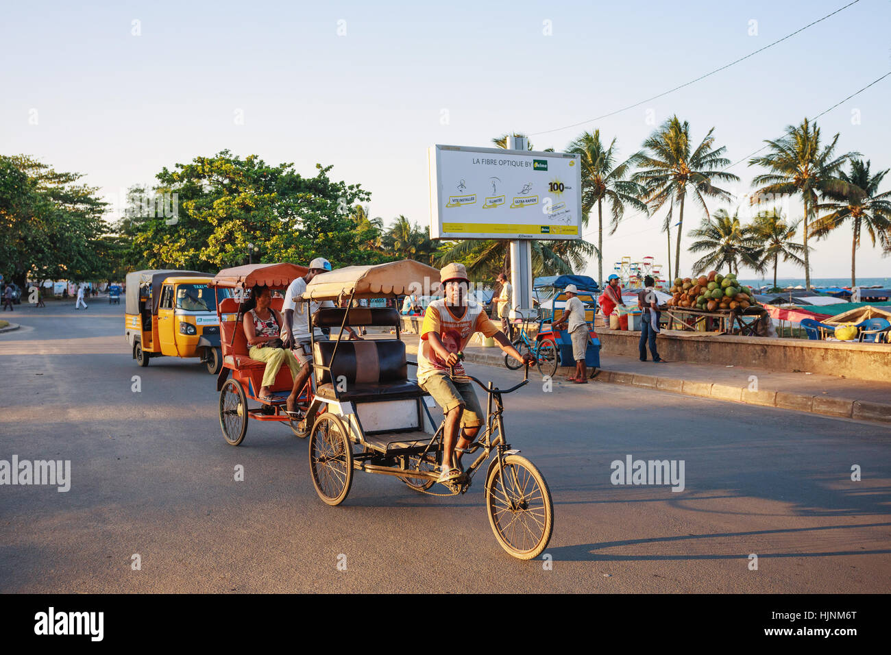 TOAMASINA, MADAGASCAR - OCTOBER 17, 2016: Traditional rickshaw bicycle ...