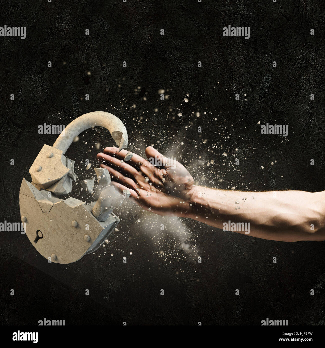 Image of human hand breaking stone lock hi-res stock photography and ...