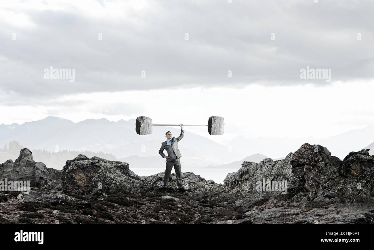 Lifting heavy stone hi-res stock photography and images - Alamy