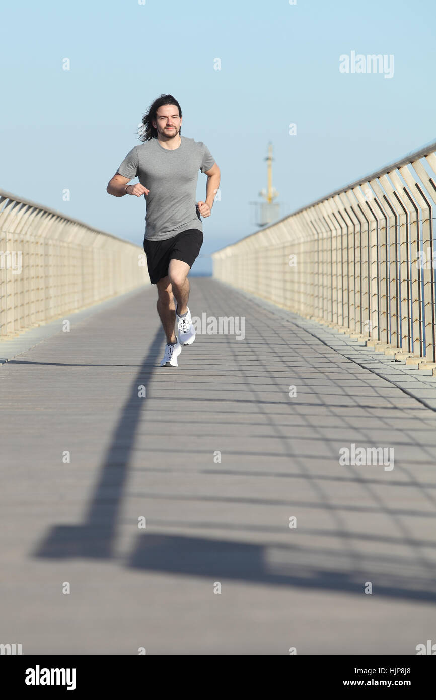 Men running towards camera hi-res stock photography and images - Alamy