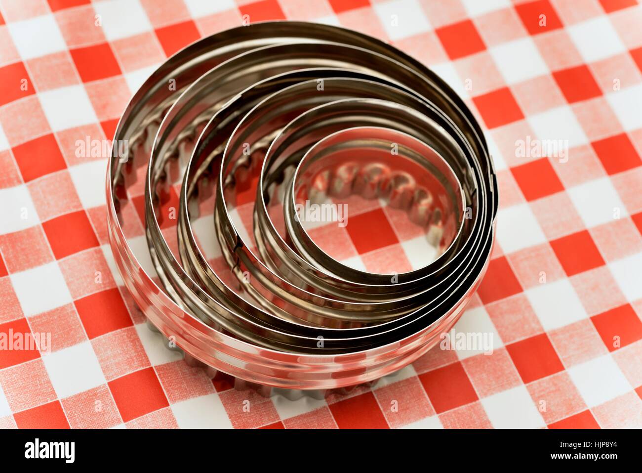 Set of 6 double sided stainless steel cutter Stock Photo - Alamy