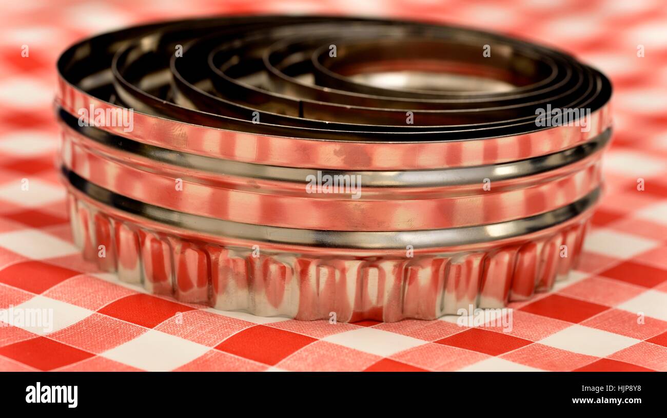 Set of 6 double sided stainless steel cutter Stock Photo - Alamy