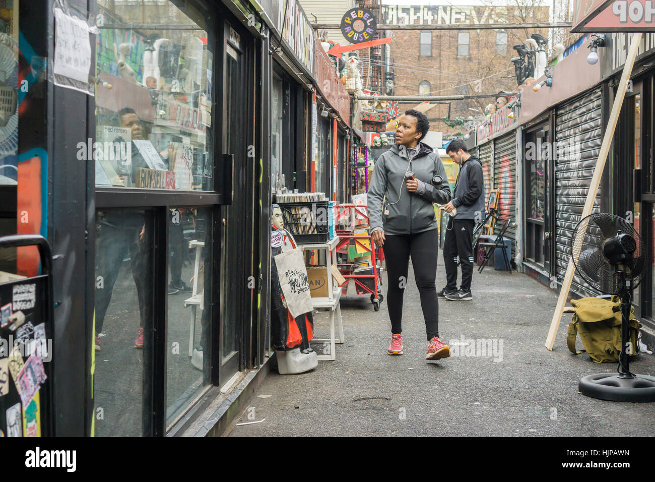 An alley converted in a shopping arcade using shipping containers in ...