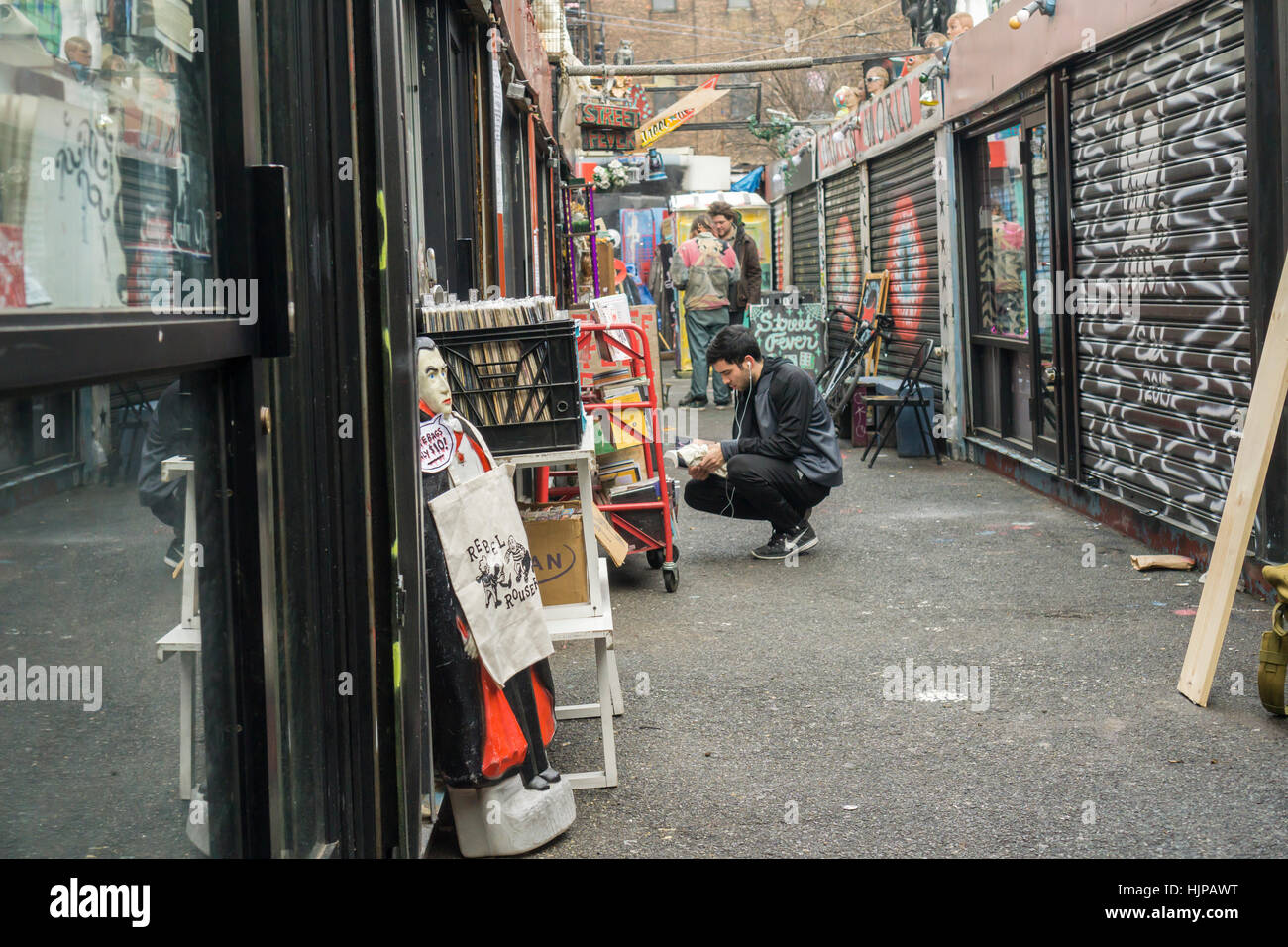 An alley converted in a shopping arcade using shipping containers in ...