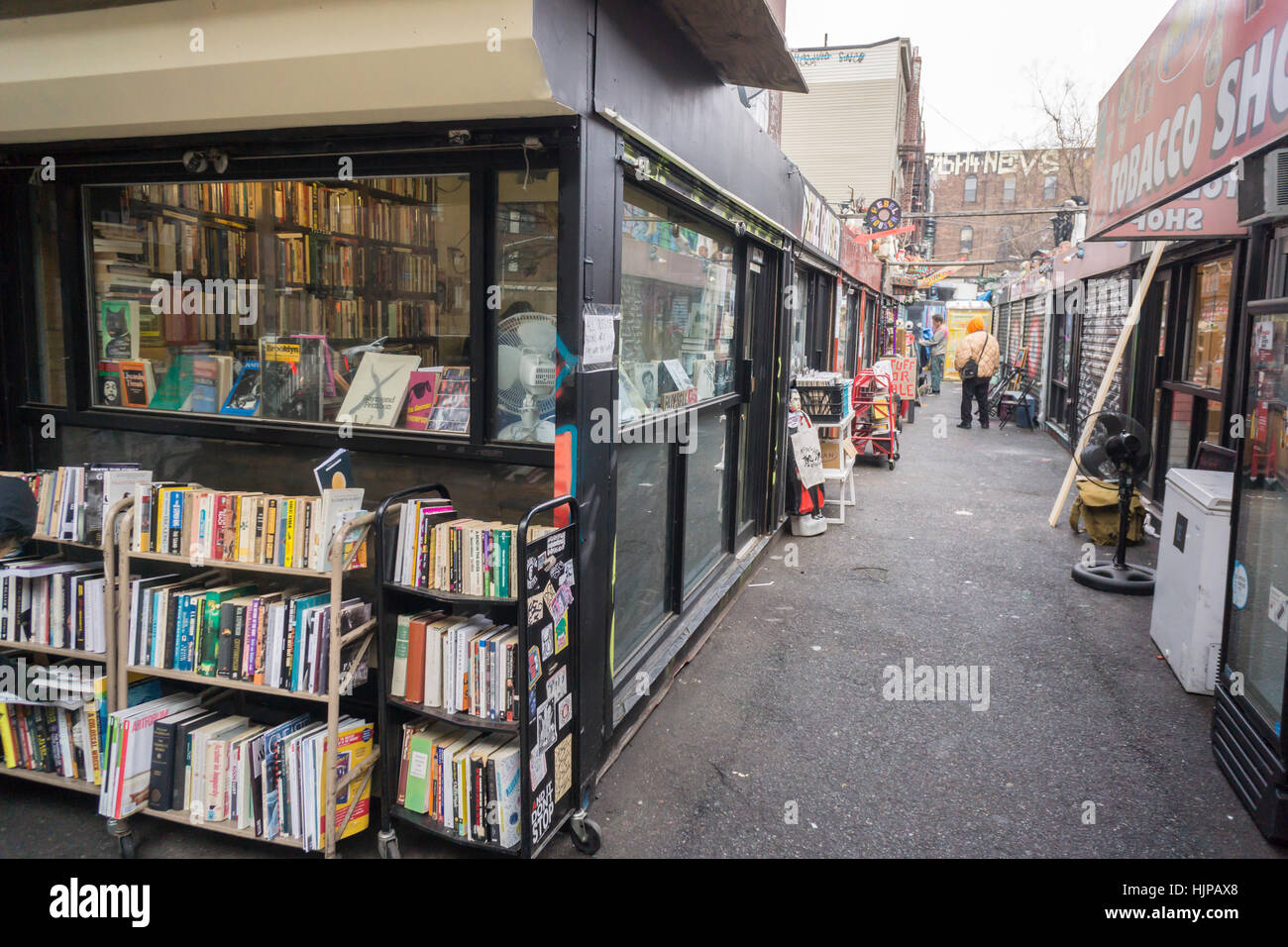 An alley converted in a shopping arcade using shipping containers ...