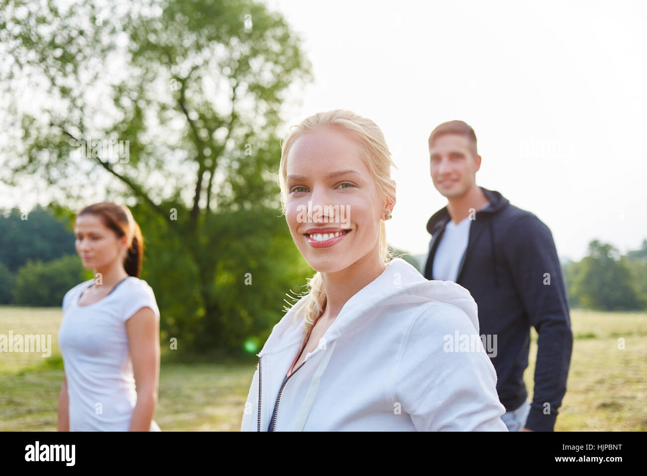 Wellness group training for good health in the nature Stock Photo - Alamy