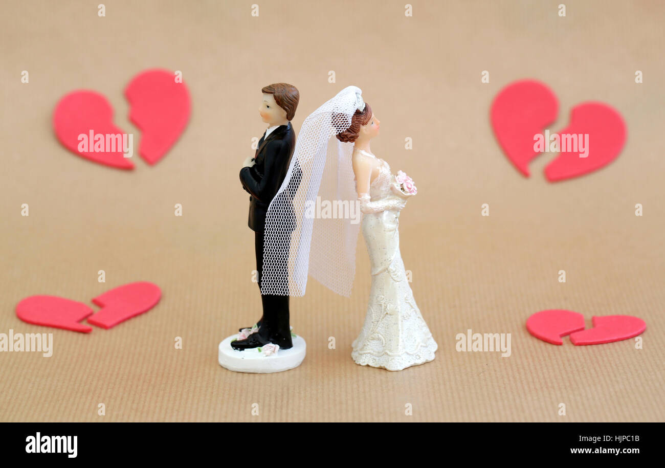 A divorced couple with broken hearts Stock Photo - Alamy