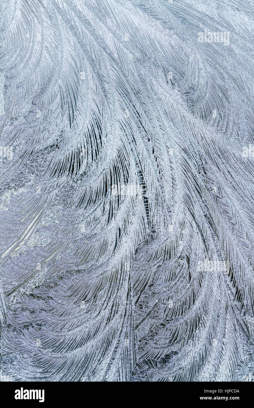 Frosty patterns on the window Stock Photo - Alamy