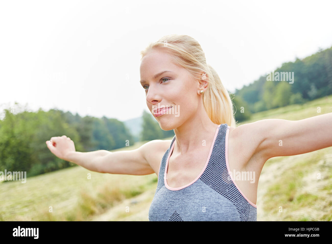 Stretch arms hi-res stock photography and images - Alamy