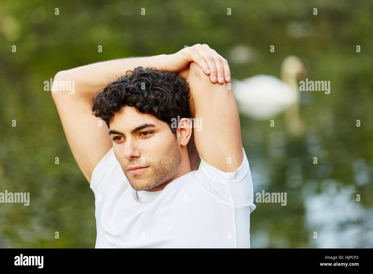 Stretching arm hi-res stock photography and images - Alamy