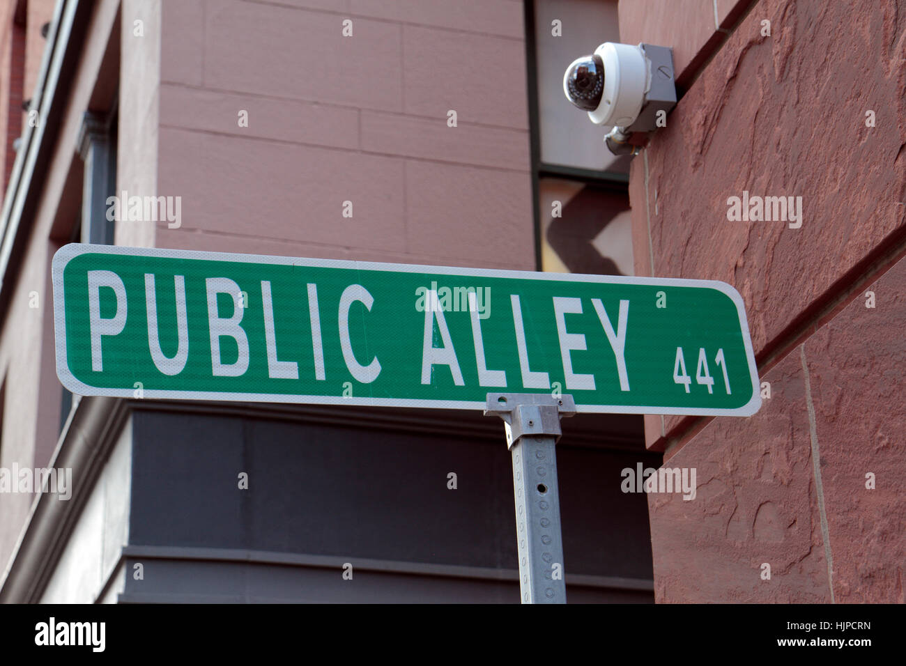 Sign for Public Alley with a CCTV in frame behind, Boston ...