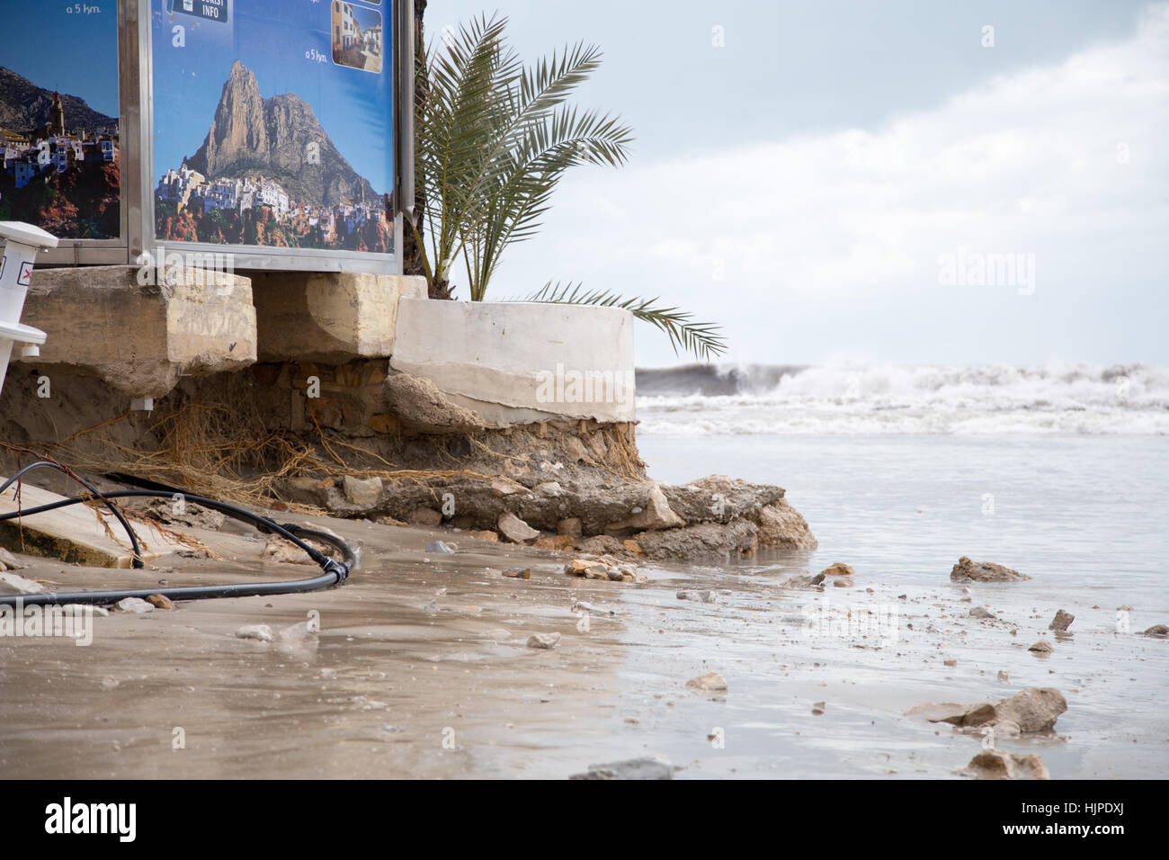 Storm damage on a spanish resort beach Stock Photo - Alamy