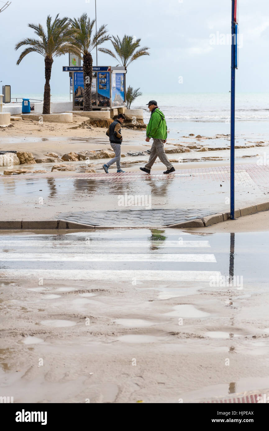 Storm damage on a spanish resort beach Stock Photo - Alamy