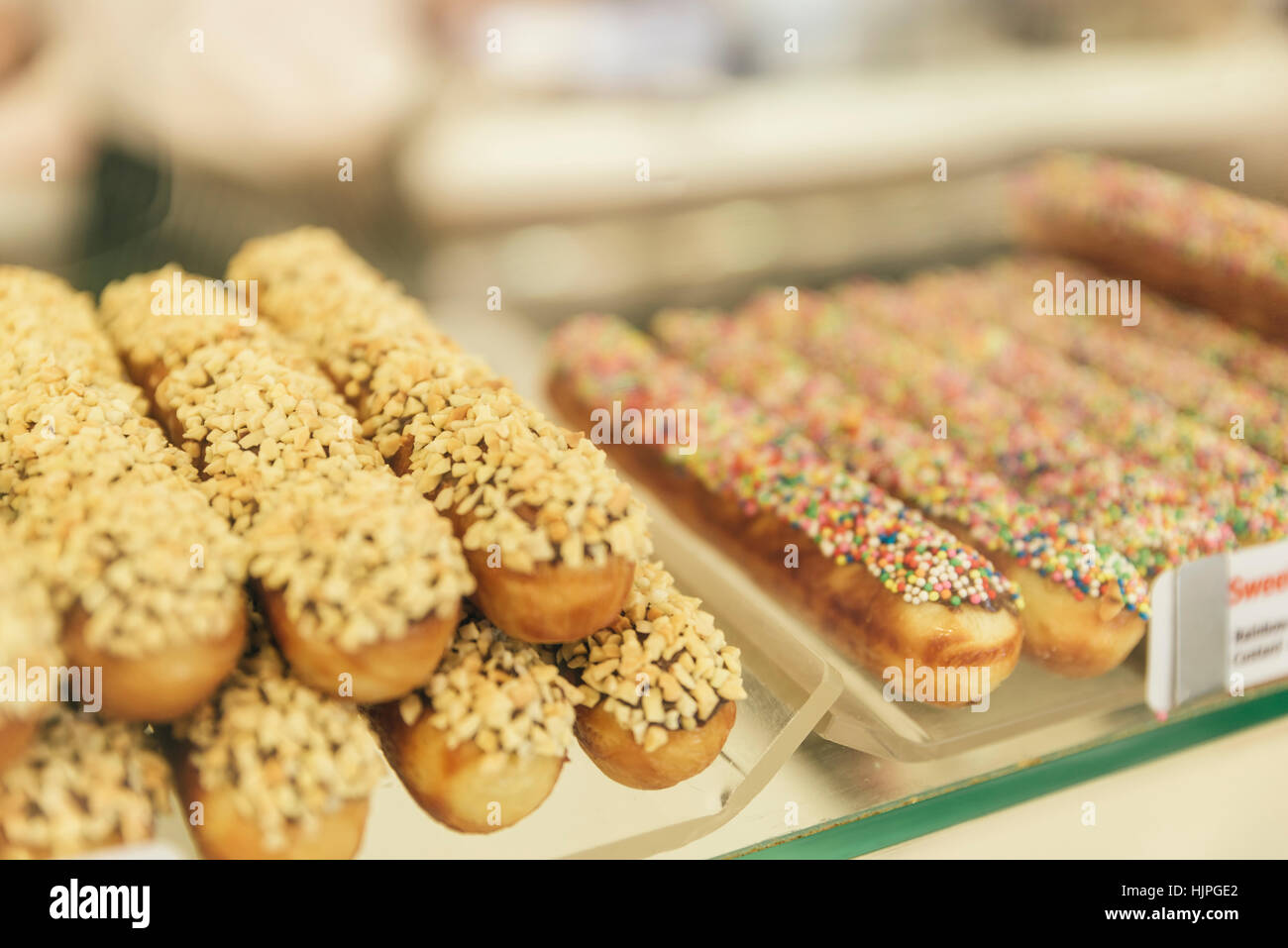 Various pastry type on shelf in bakery shop Stock Photo - Alamy