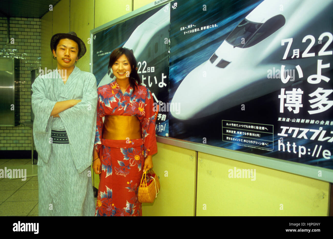Couple dressed in traditional Yukata (man) and kimono (woman). In the ...