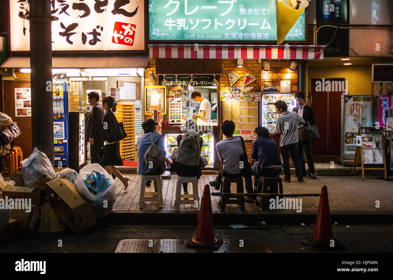 Food stand, people and garbage, Street scene, next to Shinjuku station ...