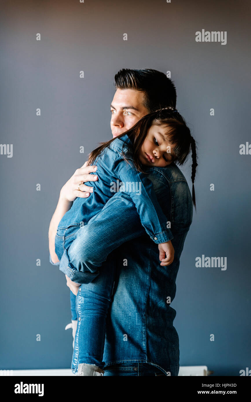 Father hugs sad family hi-res stock photography and images - Alamy