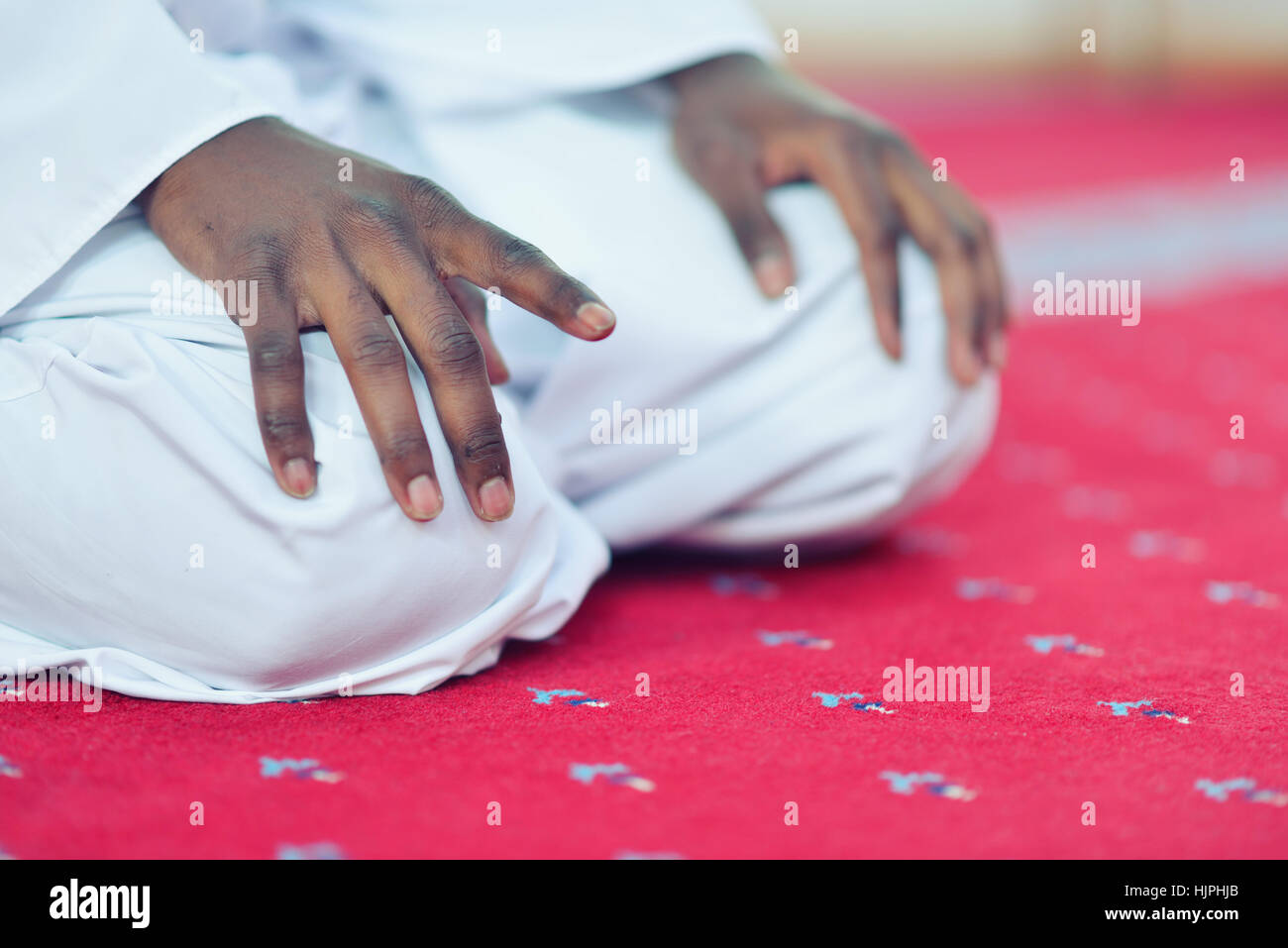 African Muslim Man Making Traditional Prayer To God While Wearing ...
