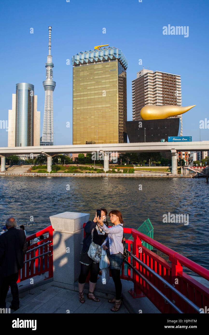 Skytree tower and Asahi building from Azuma bridge, sumida river ...