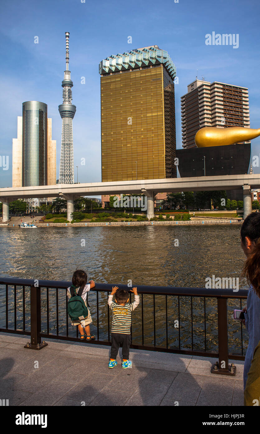 Kid, kids, Sky Tree and Asahi building from Sumidagawa river, Asakusa ...