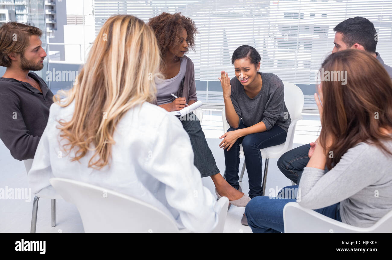 Depressed black man group therapy hi-res stock photography and images ...