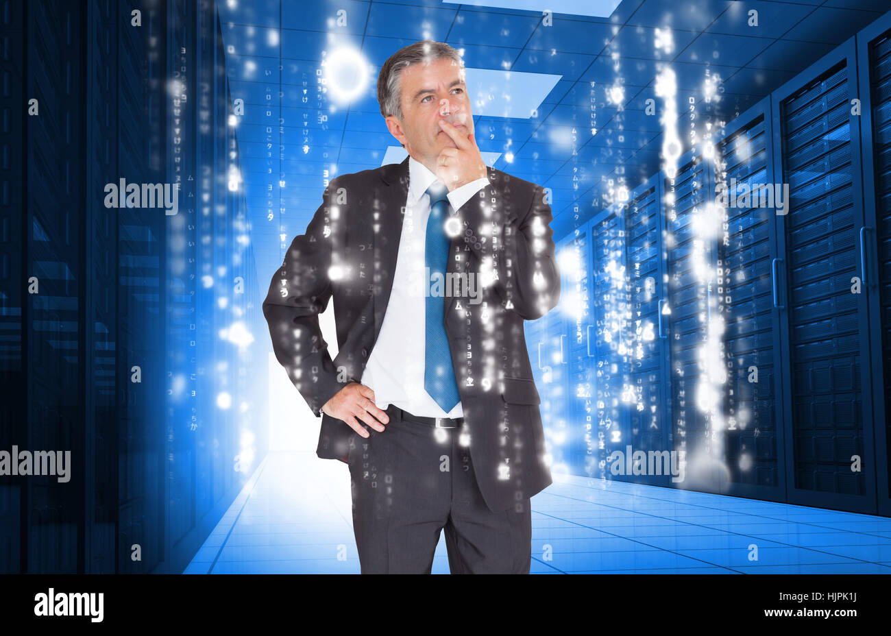 Businessman looking thoughtful in data center with raining computer ...
