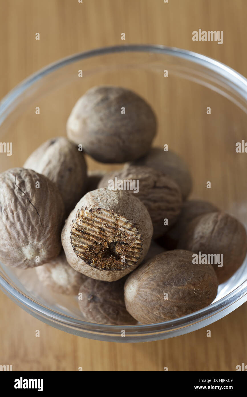 glass bowl with nutmeg Stock Photo - Alamy