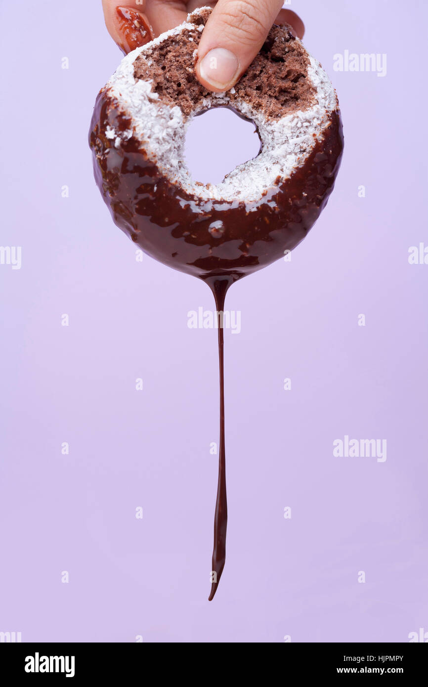 donut human hand Stock Photo - Alamy