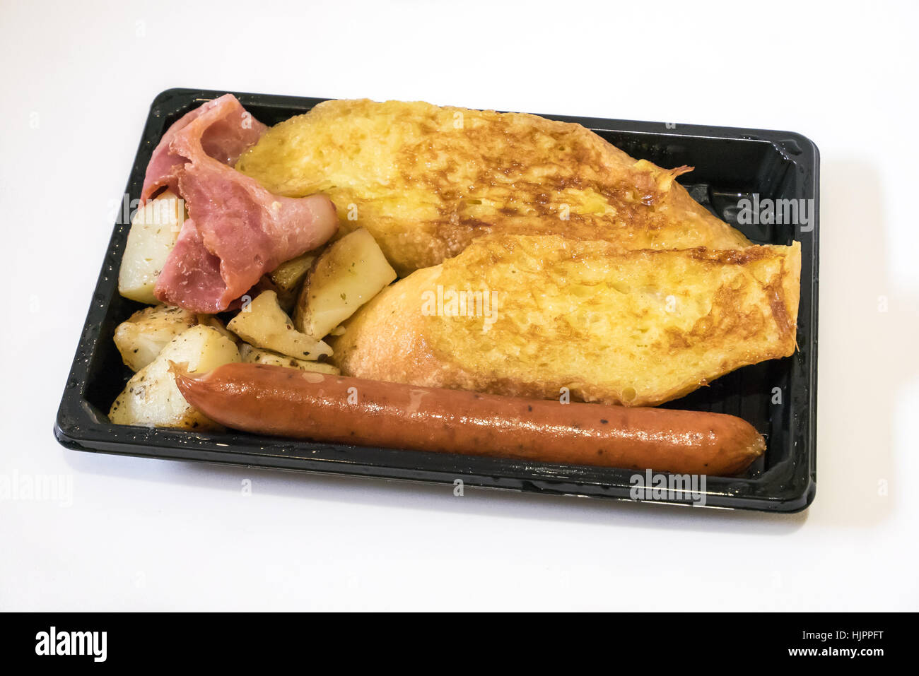 The delicious breakfast set on black plastic tray Stock Photo - Alamy