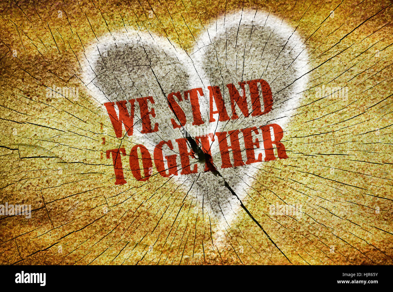 Text We Stand Together written over a heart on yellow background Stock ...