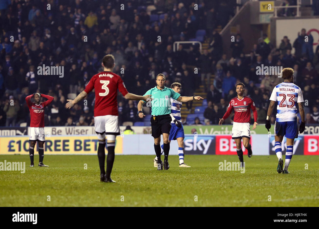 Referee Stephen Martin awards Reading a penalty after a foul on Liam ...