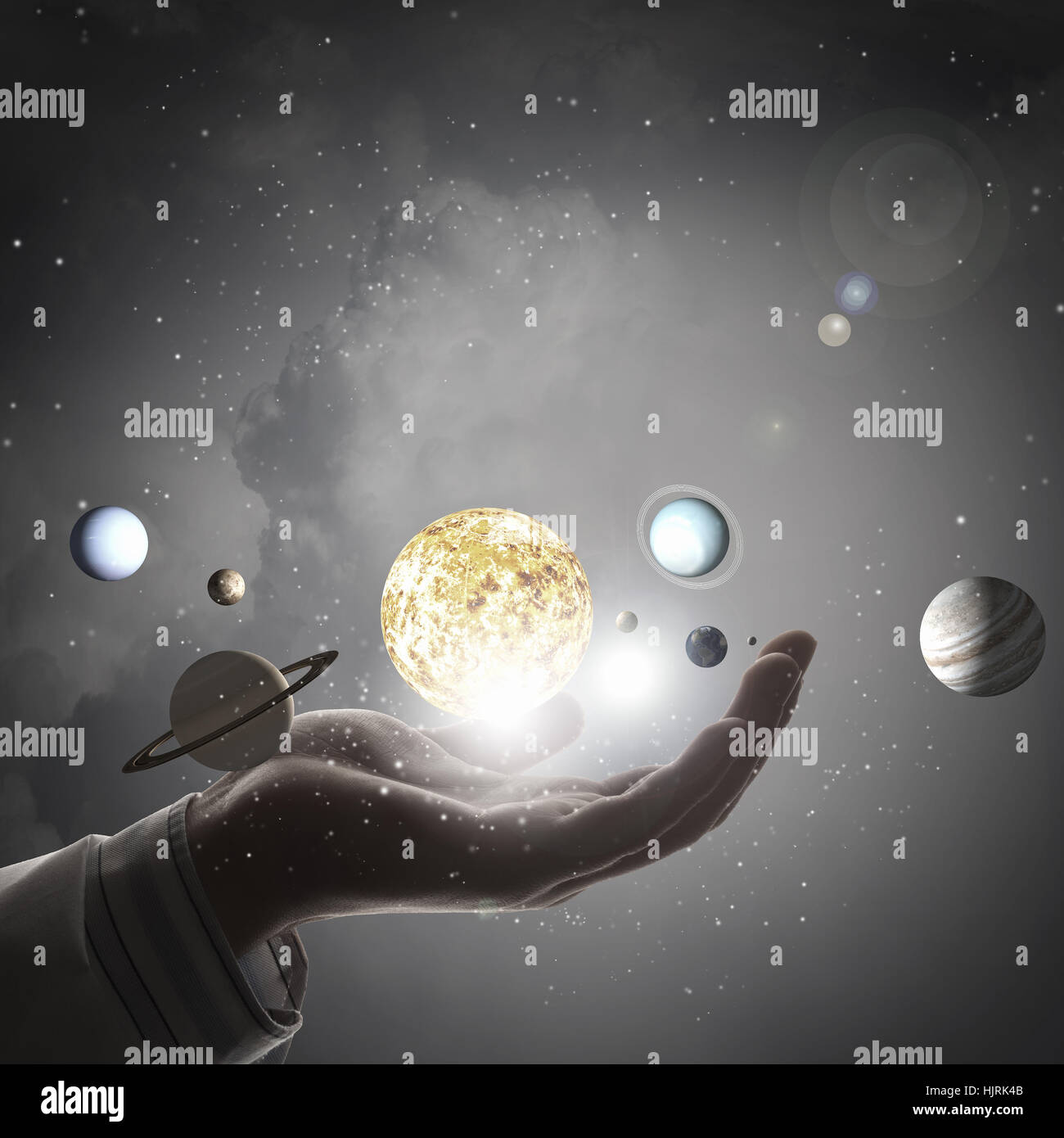 Close up of planet sun system in your hand Stock Photo - Alamy