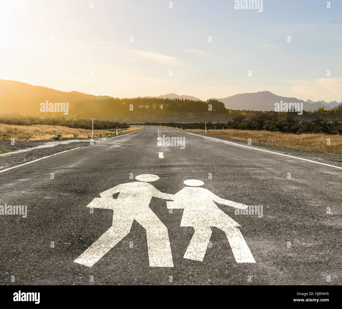 Natural lanscape and asphalt road with people figures Stock Photo - Alamy