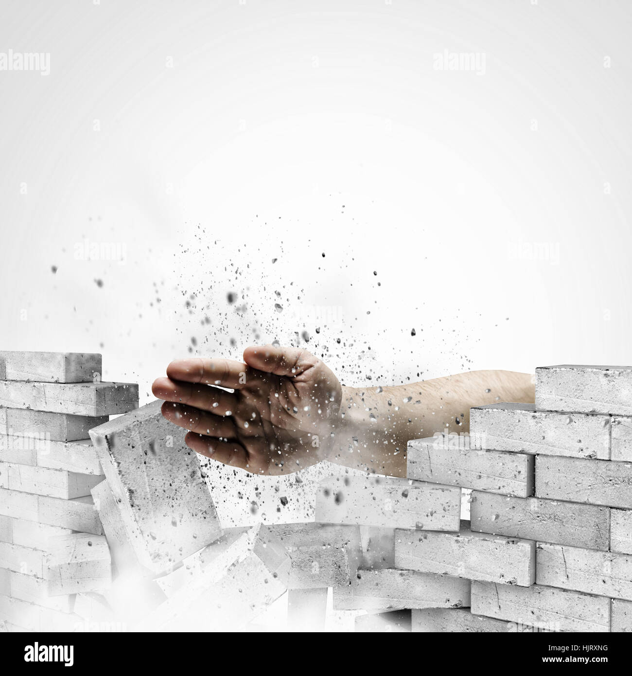 Human hand breaking brick hi-res stock photography and images - Alamy