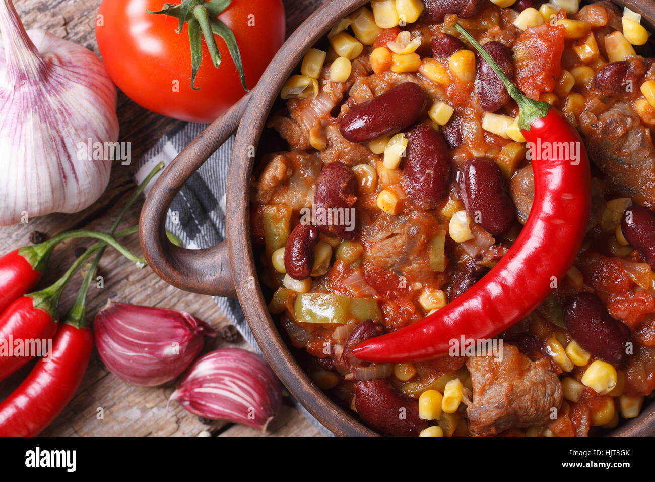 hot chili con carne in a pot macro. horizontal top view Stock Photo - Alamy