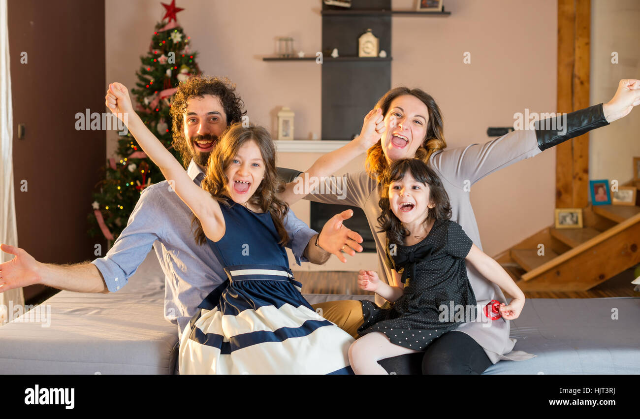 Happy family mom dad tree hi-res stock photography and images - Alamy