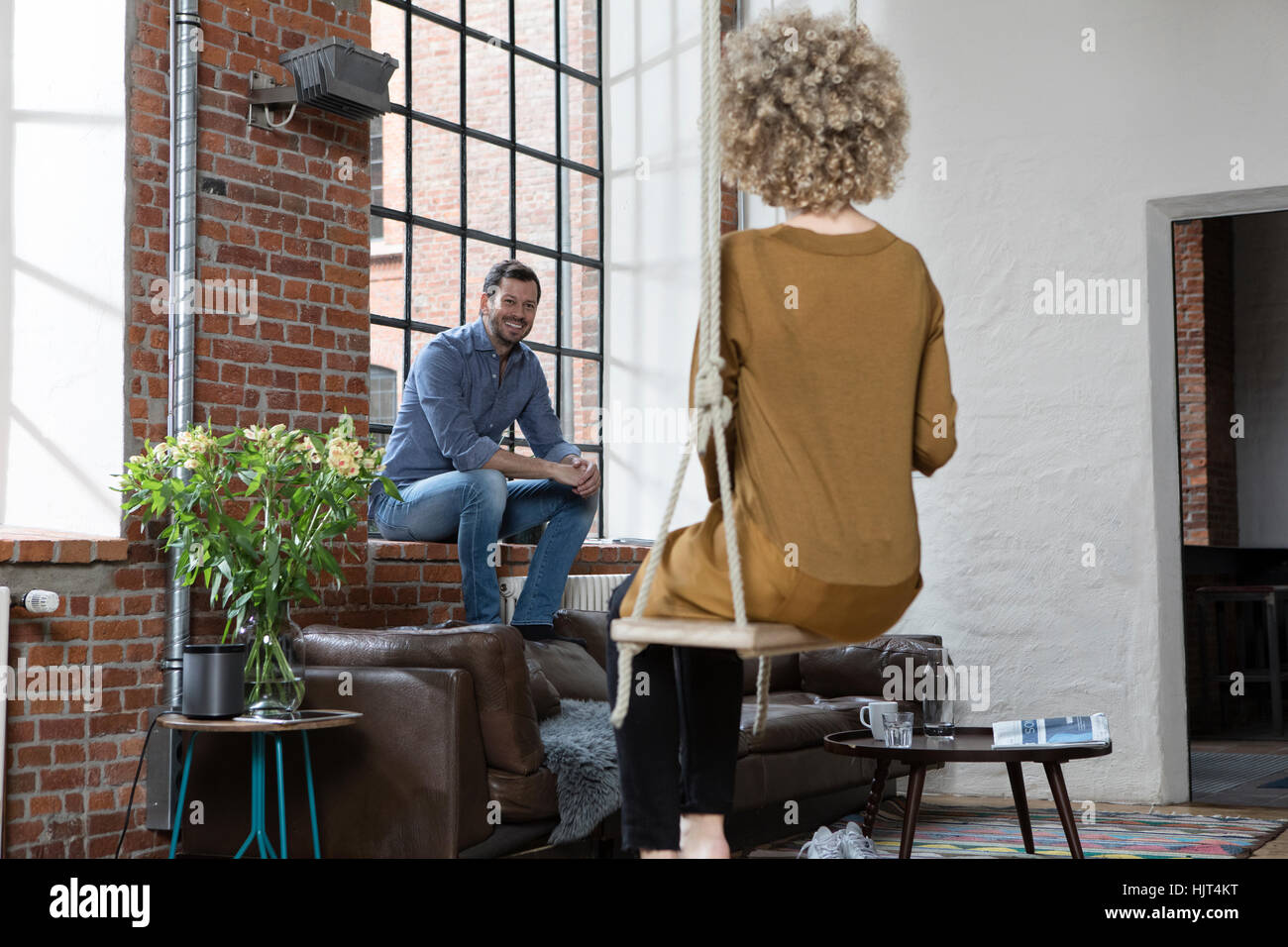 Women talking on cozy living hi-res stock photography and images - Alamy
