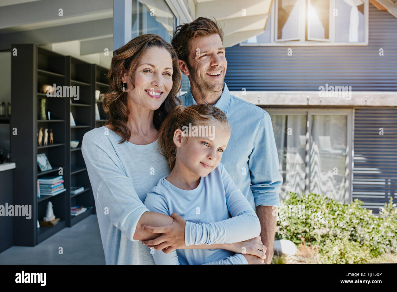 Happy family at home Stock Photo - Alamy
