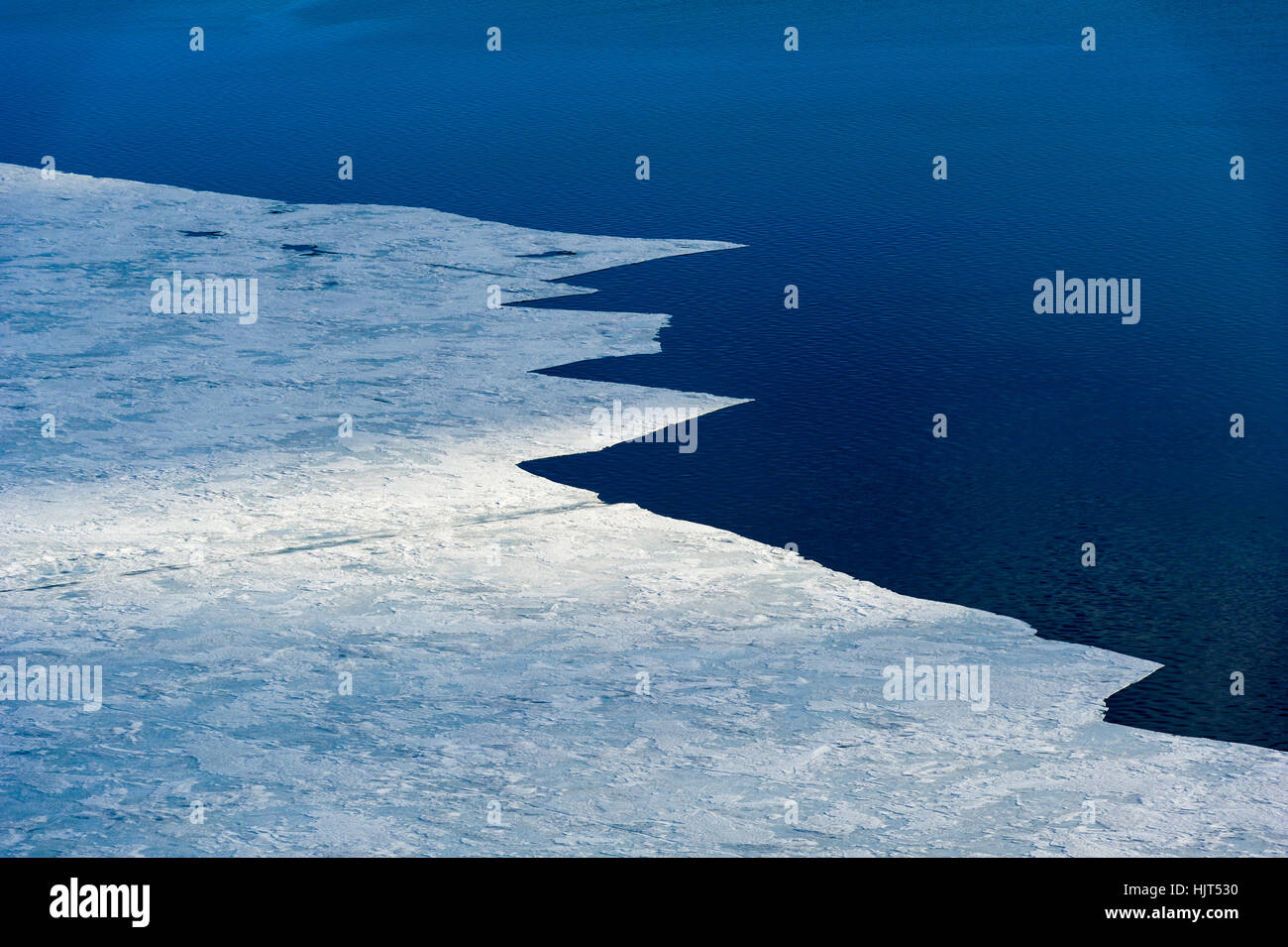 The melting edge of sea ice where it meets the open ocean during the ...