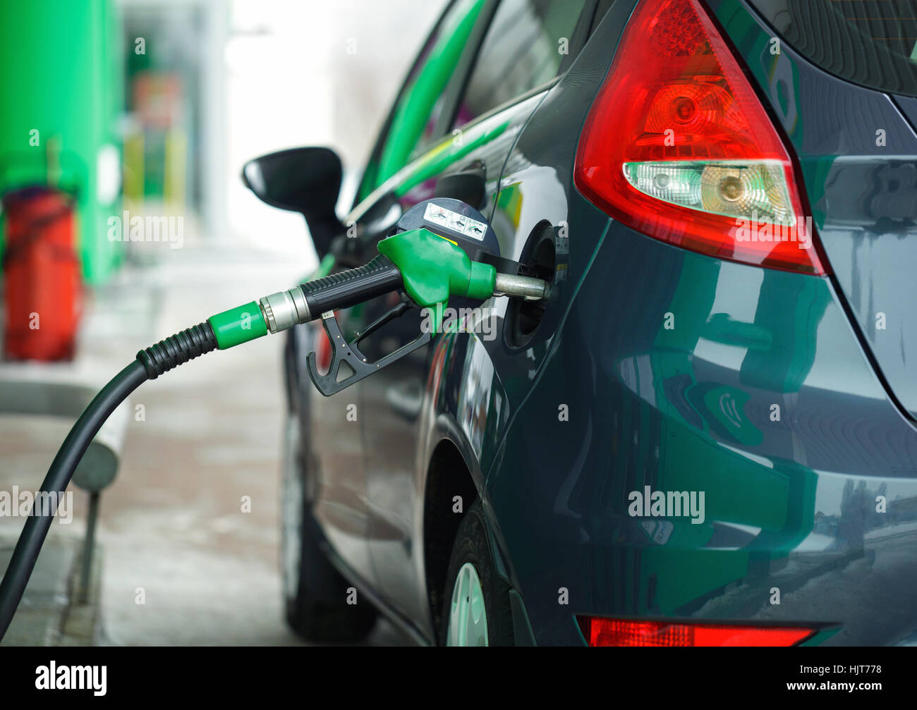 Car refueling on a petrol station in winter closeup Stock Photo - Alamy