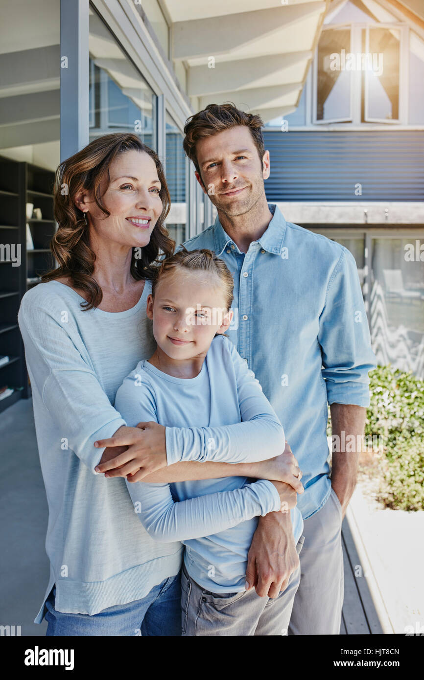 Happy family standing terrace hi-res stock photography and images - Alamy
