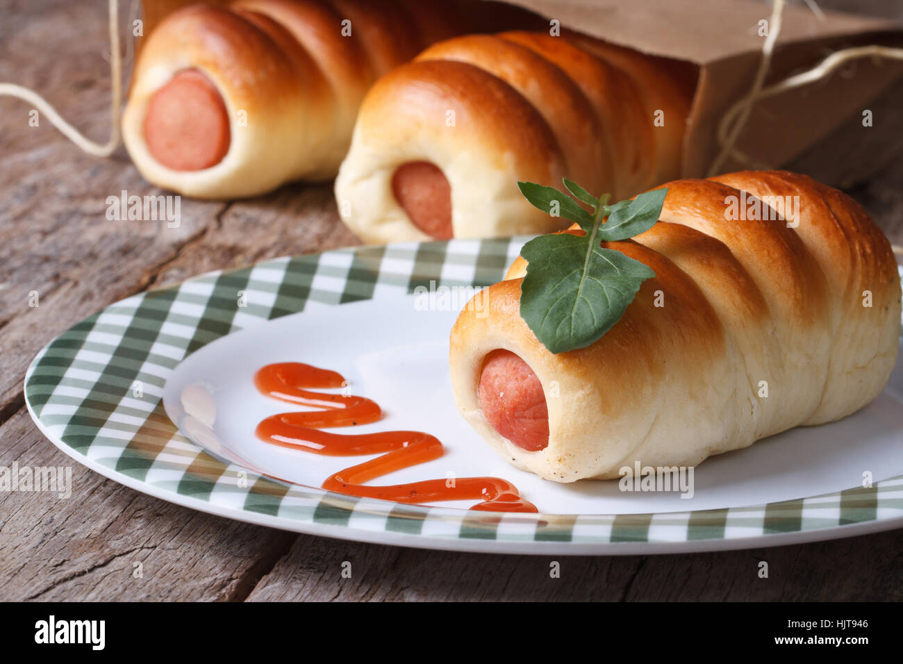 Plate sausage rolls hi-res stock photography and images - Alamy