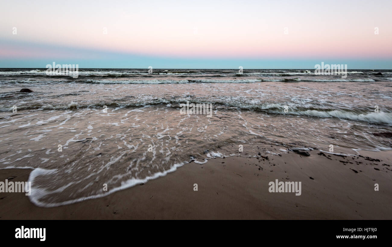 rocky sea beach with wide angle perspective over the sea clouds Stock ...