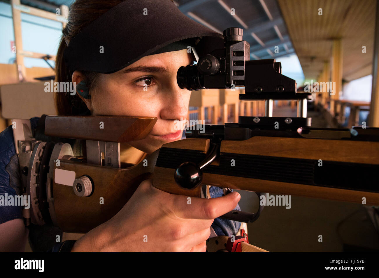 Woman sporting rifle aiming hi-res stock photography and images - Alamy
