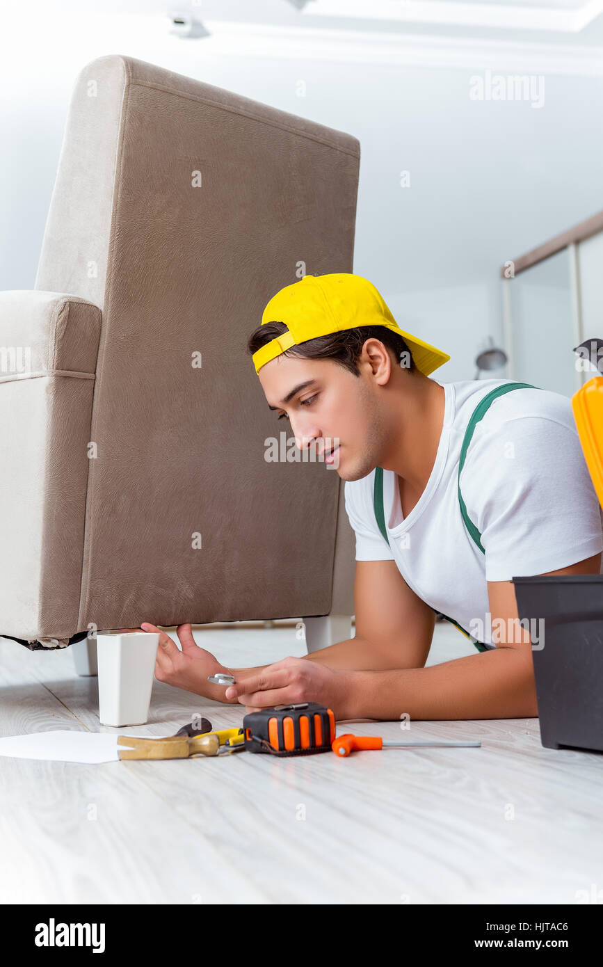 Worker repairing armchair hi-res stock photography and images - Alamy