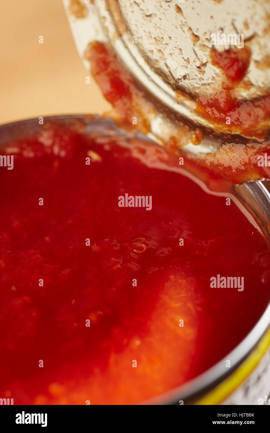 an open can of crushed tomato Stock Photo - Alamy
