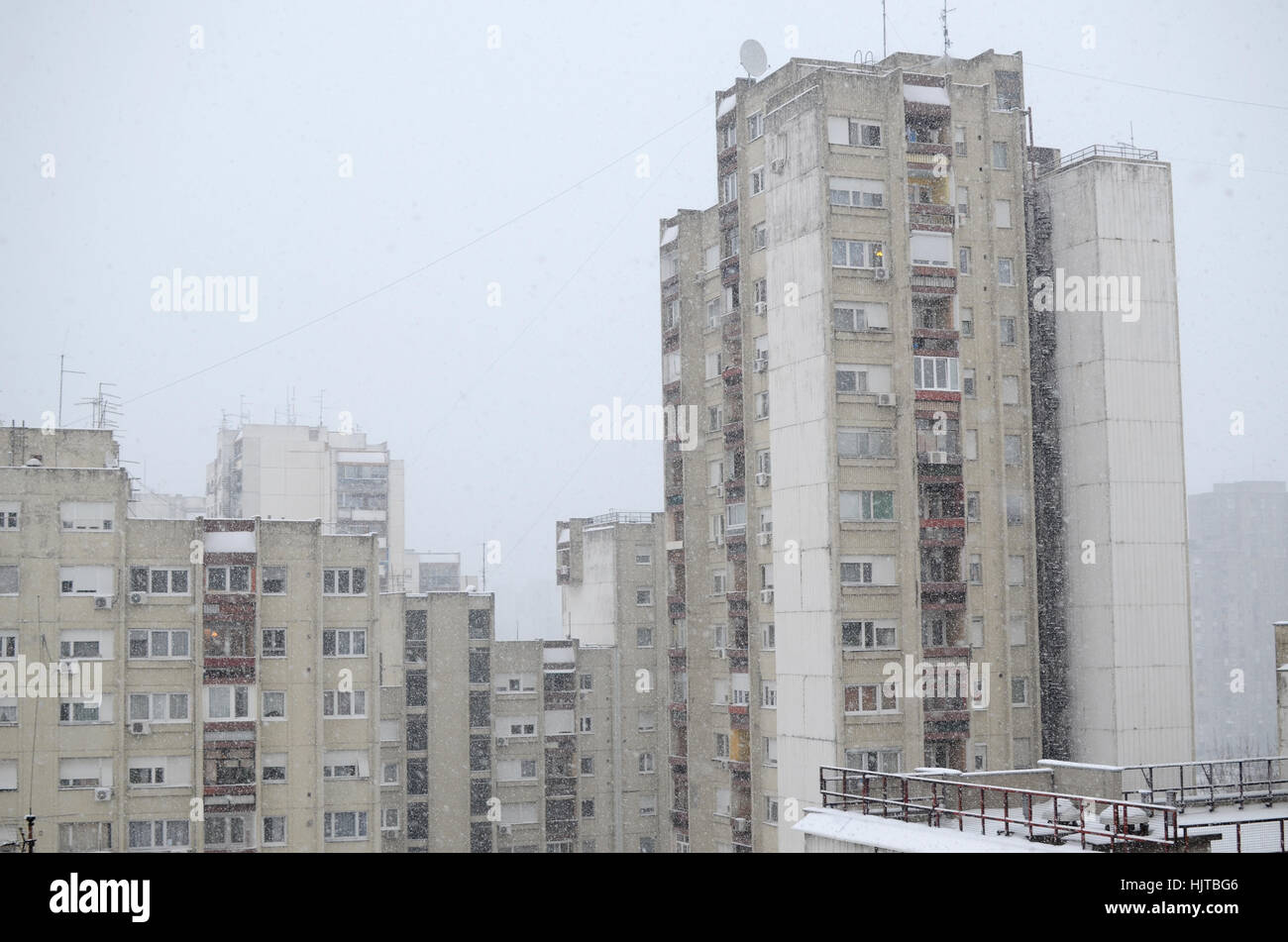 Block of residential buildings in the winter snowfall Stock Photo - Alamy